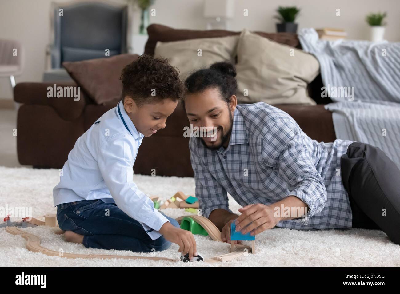 Dad kid playing toys home hi-res stock photography and images - Alamy