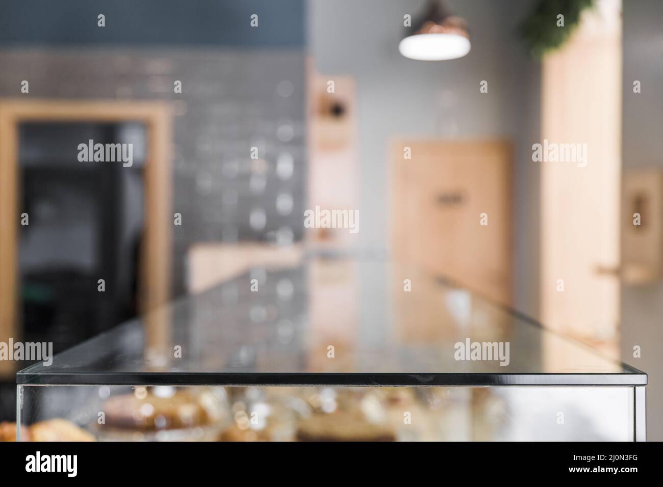 Blur backdrop coffee shop with glass counter Stock Photo - Alamy