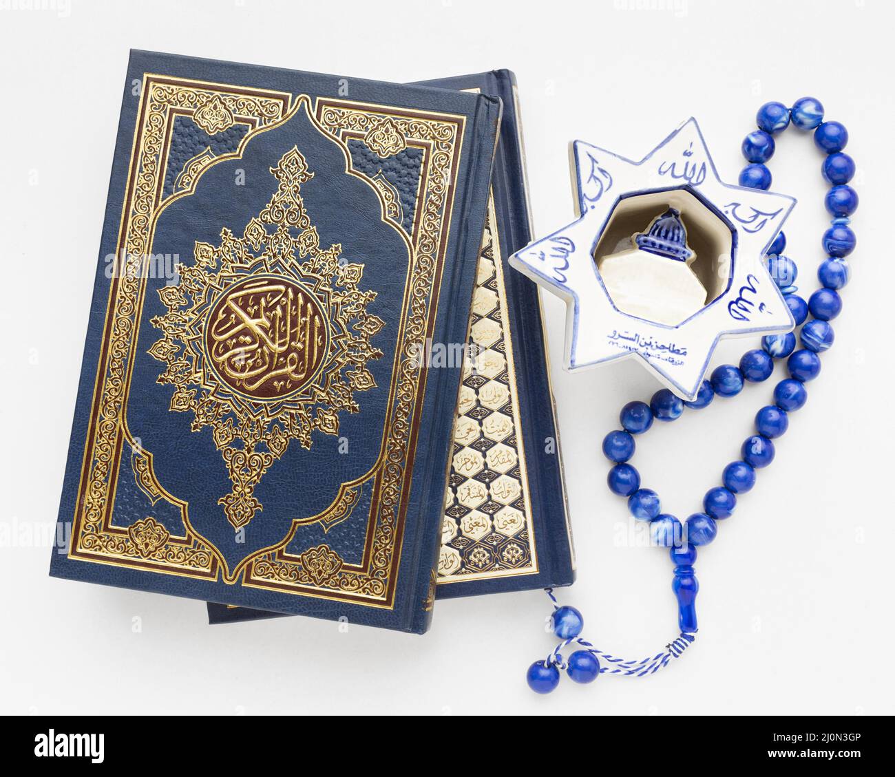 Quran cover hi-res stock photography and images - Alamy