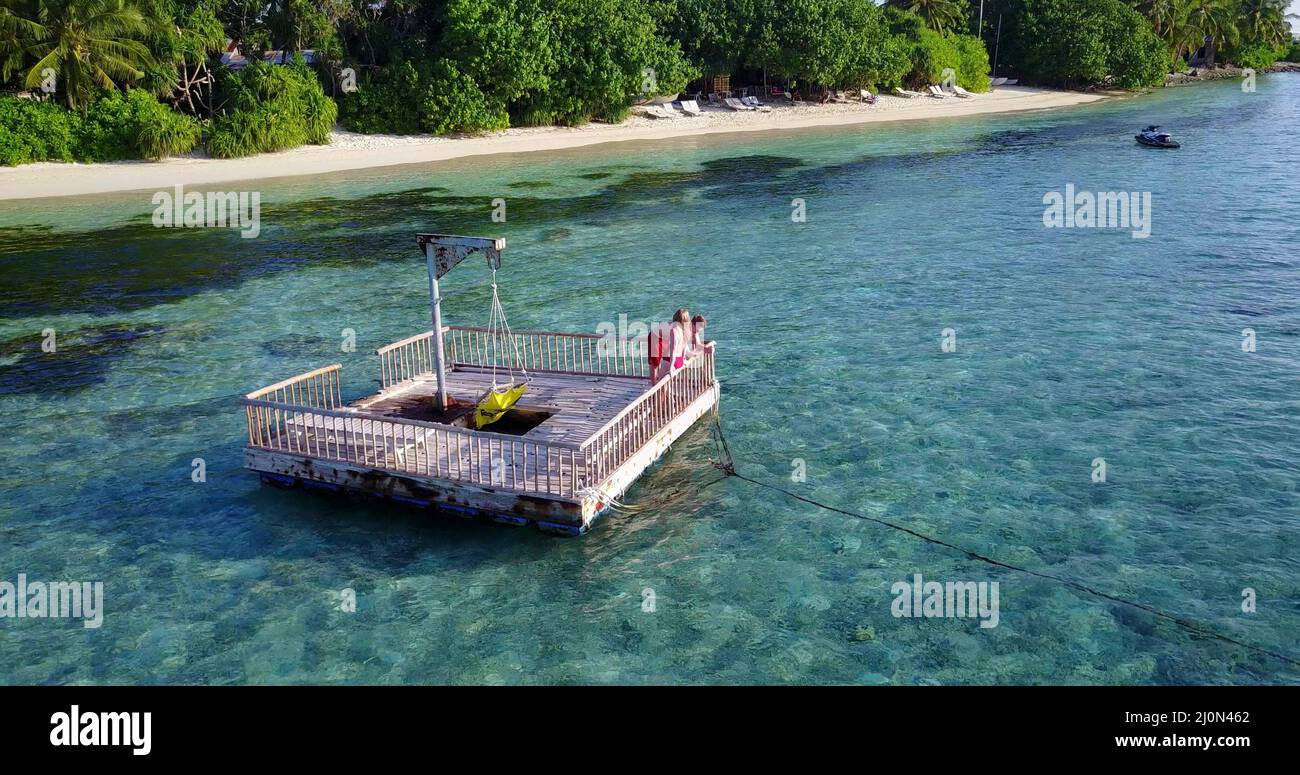 Man relaxing on beach floating hi-res stock photography and images - Alamy