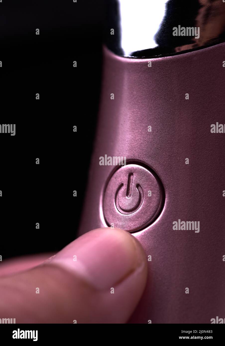 Close-up of the power button of an electronic device Stock Photo - Alamy