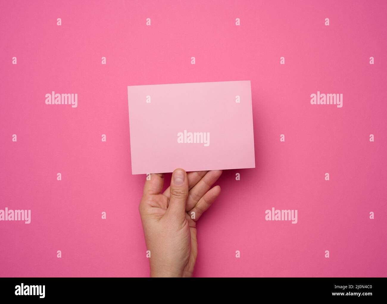 Female hand holding paper hi-res stock photography and images - Alamy