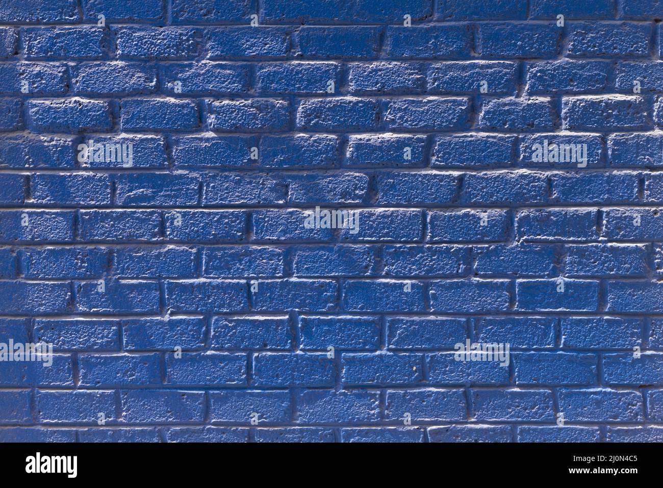 Copy space front view blue brick wall Stock Photo - Alamy