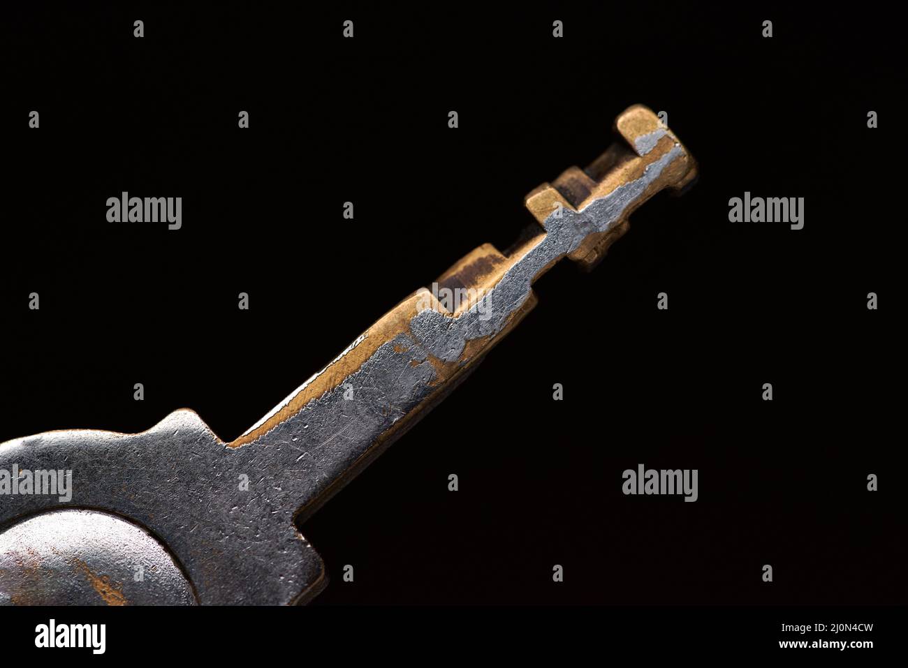 The old rusty key isolated Stock Photo - Alamy