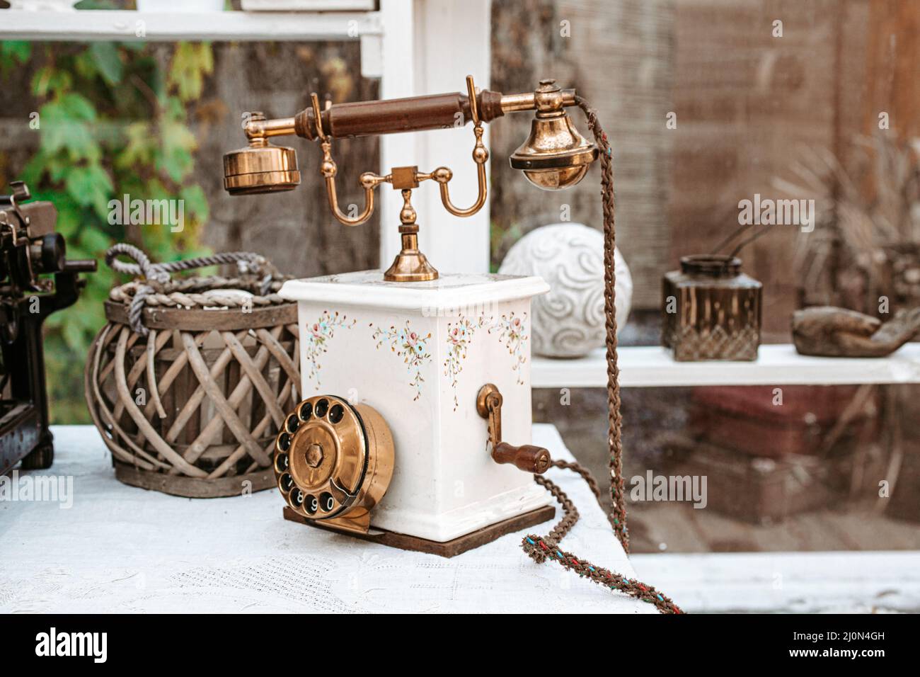 Vintage old phone in shabby chic interior Stock Photo - Alamy