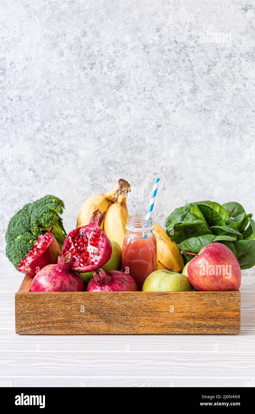 Healthy diet food and smoothie in wooden tray Stock Photo - Alamy
