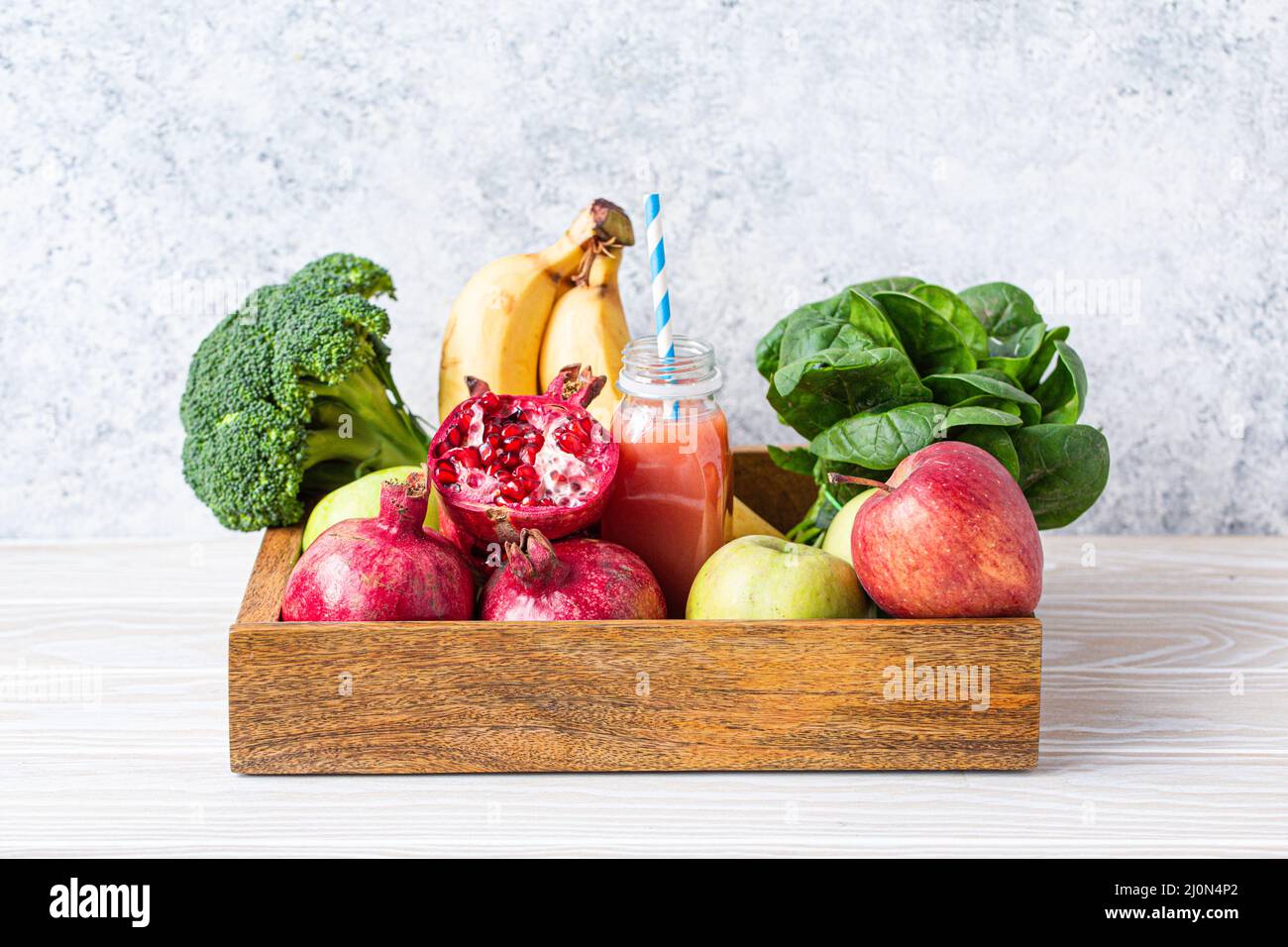 Healthy diet food and smoothie in wooden tray Stock Photo - Alamy