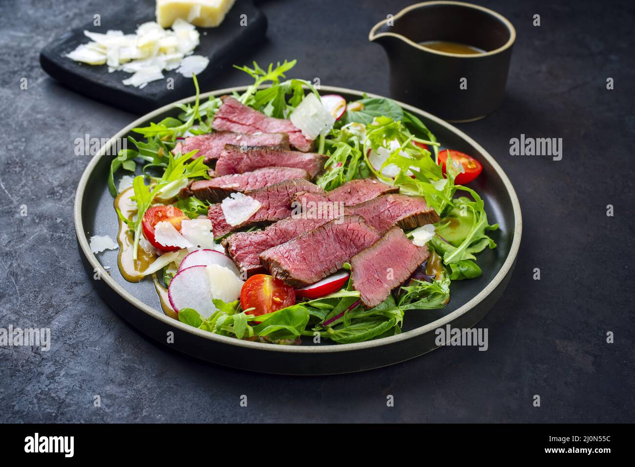 Modern style traditional fried dry aged bison beef rump steak slices ...
