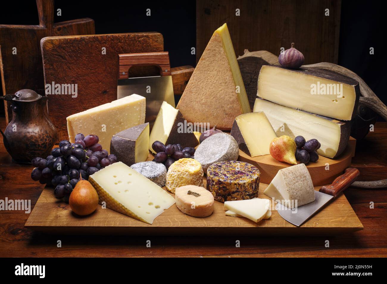 Traditional aged alpine cheese platter of the Alps with hard and soft ...