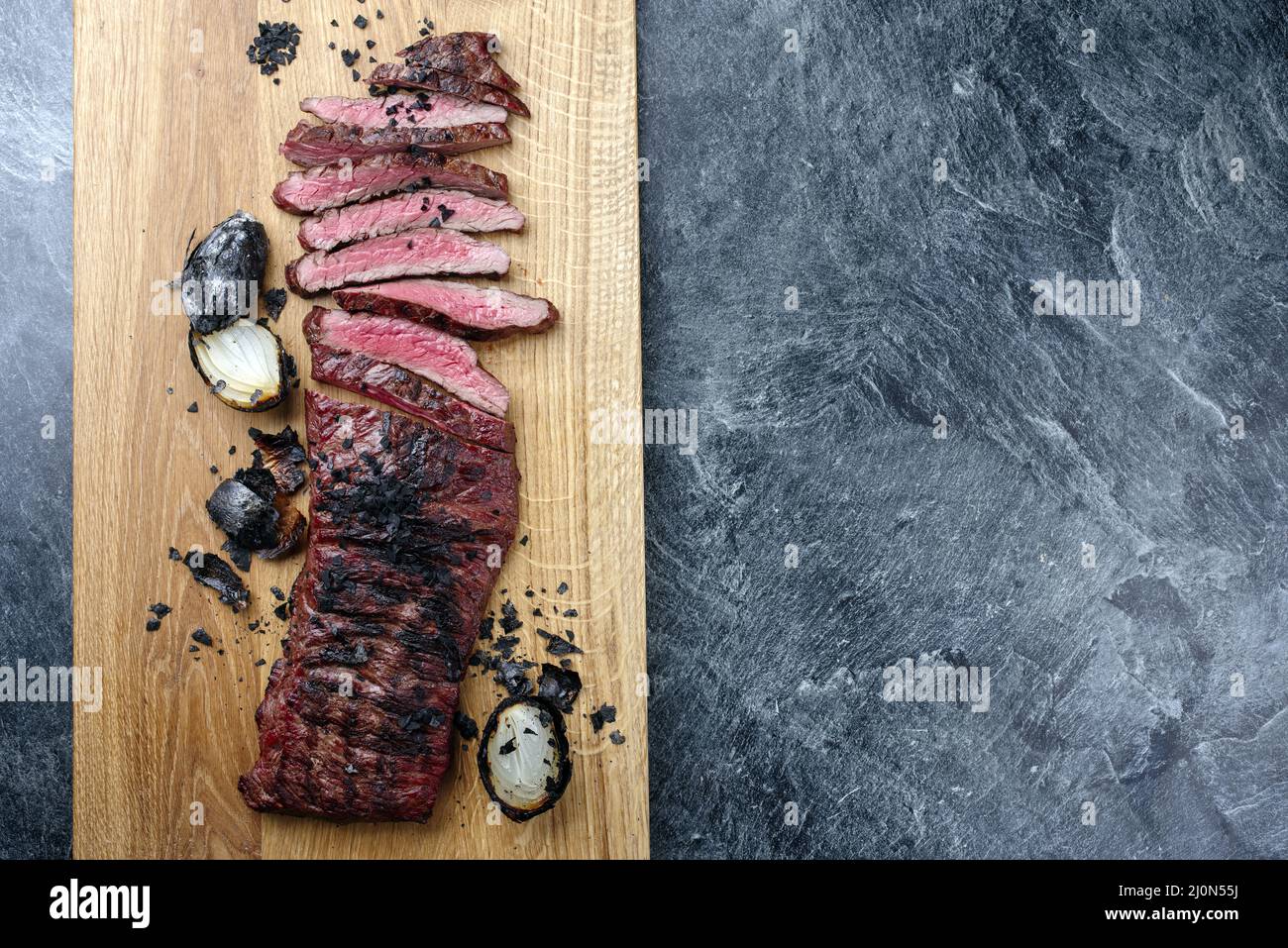 Traditional barbecue wagyu gourmet bavette steak served as top view on ...
