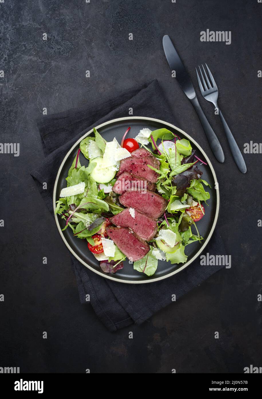 Modern style traditional fried dry aged bison beef rump steak slices ...