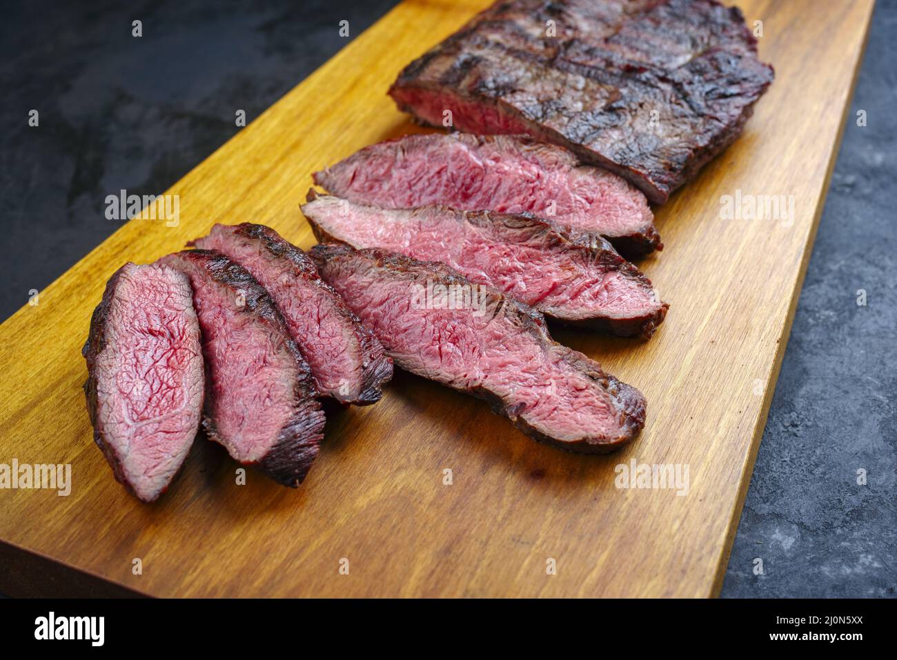 Traditional barbecue wagyu gourmet bavette steak served as top view on ...