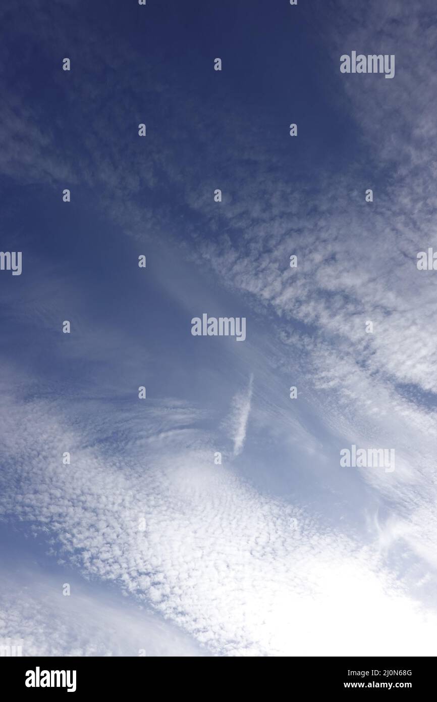 Thin veil clouds in the blue sky Stock Photo - Alamy