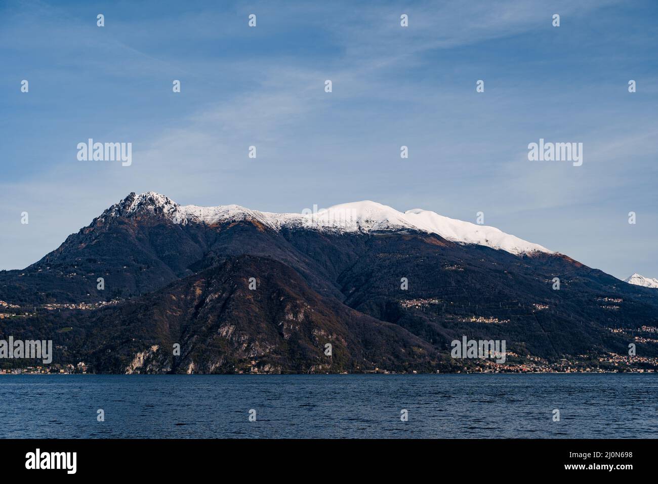 Snow on the tops of the mountains near Lake Como. Italy Stock Photo - Alamy