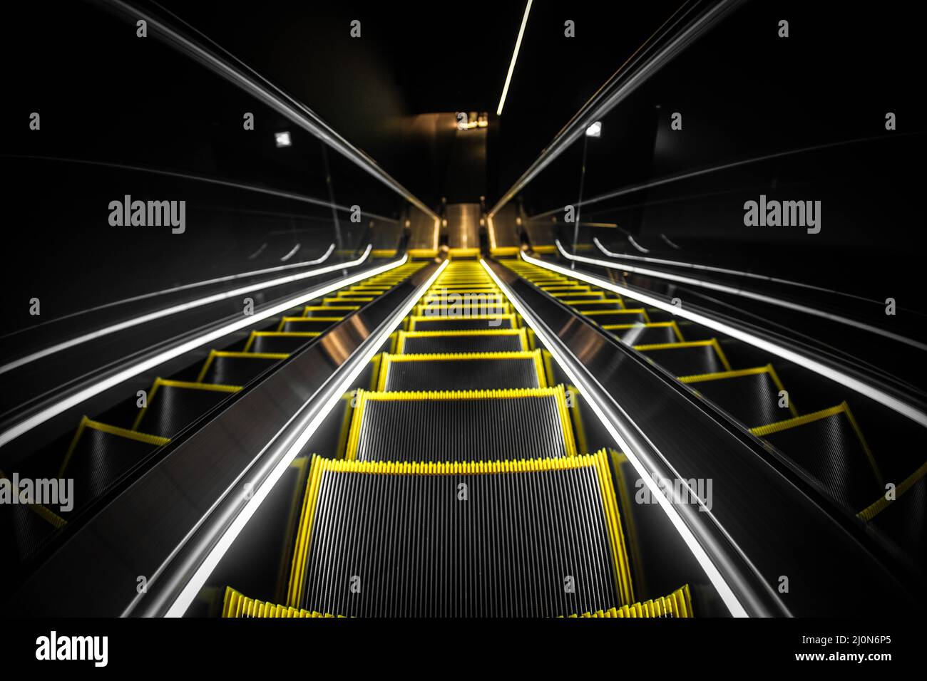 Yellow and black of the escalator Stock Photo - Alamy