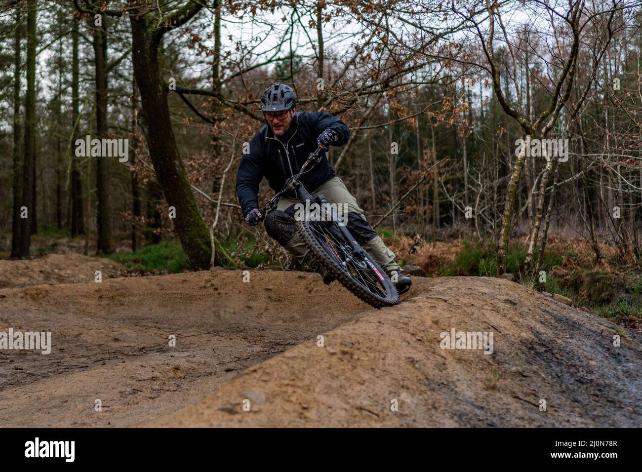 mountain biker on a berm Stock Photo - Alamy