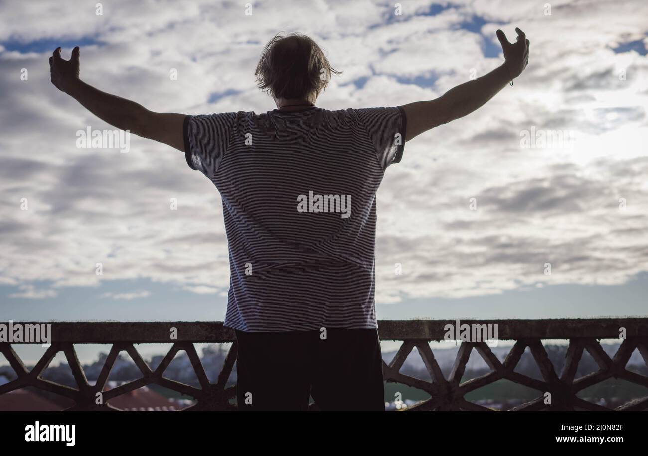 Male person on balcony hi-res stock photography and images - Alamy