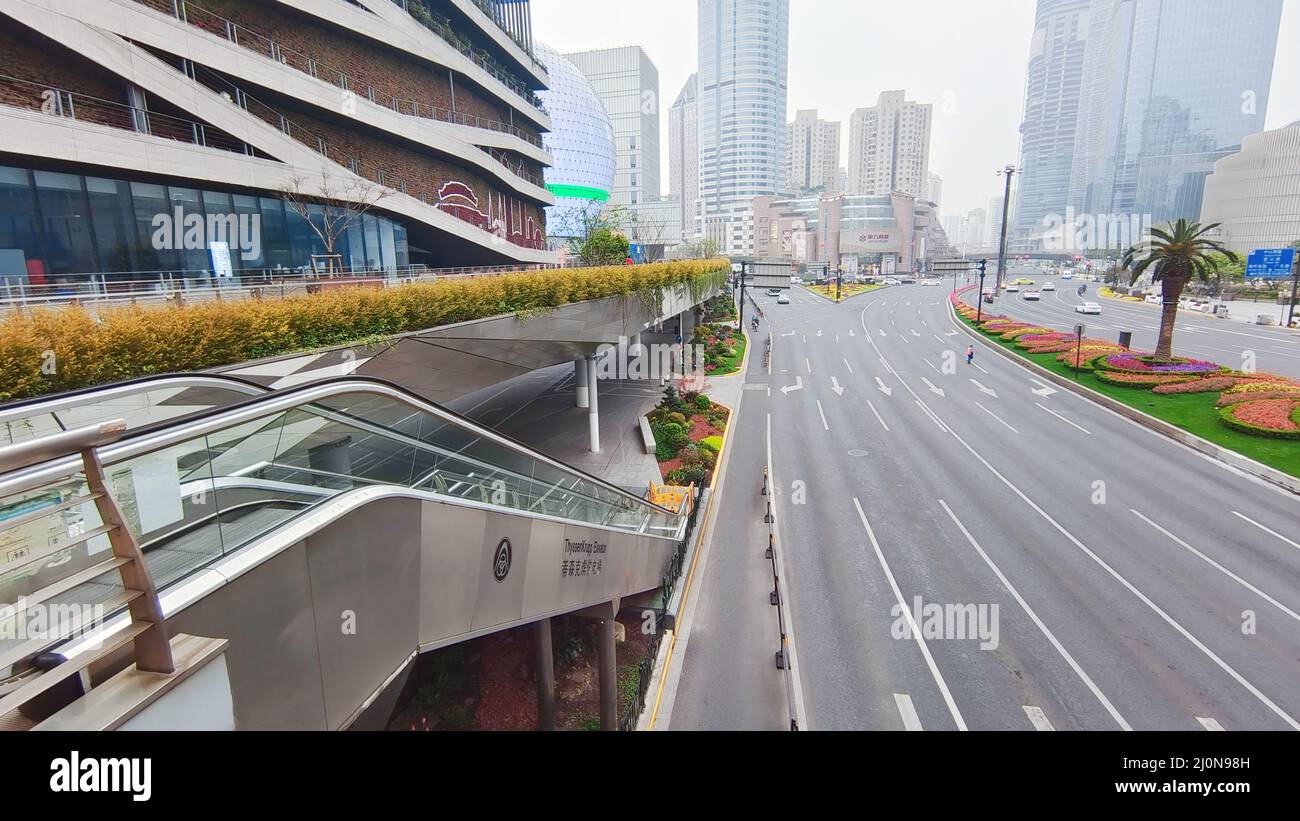 SHANGHAI, CHINA - MARCH 19, 2022 - An empty street is seen in downtown ...