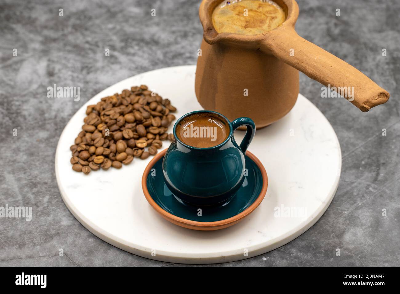 Turkish coffee on a marble background. Rustic cup and earthen coffee ...