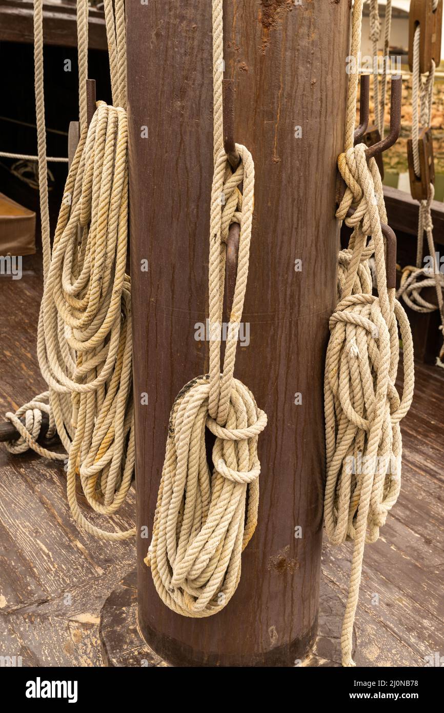 The ropes and mast of an old wooden sailing ship in detail Stock Photo ...