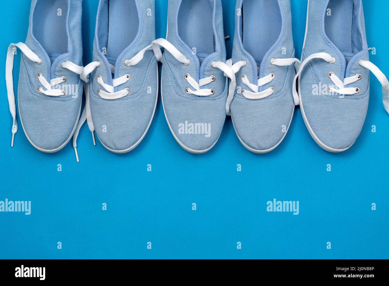 Row of shoes hi-res stock photography and images - Alamy