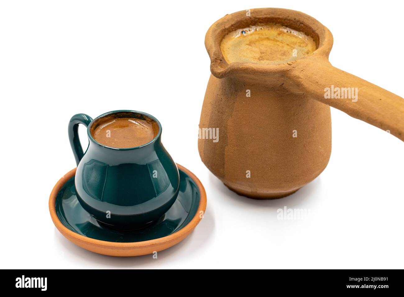 Turkish coffee on a white background. Rustic cup and earthen coffee pot ...