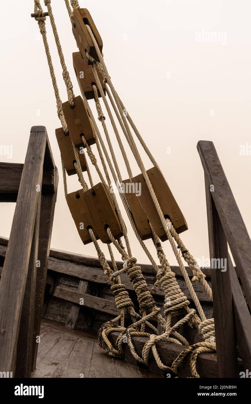 The ropes and rigging of an old wooden sailing ship in detail Stock ...