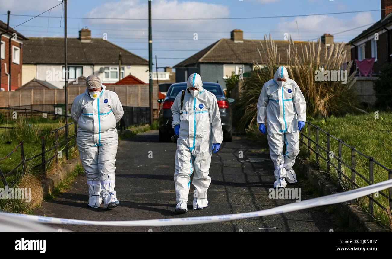 Garda forensic officers work at the scene in Finglas, north Dublin ...