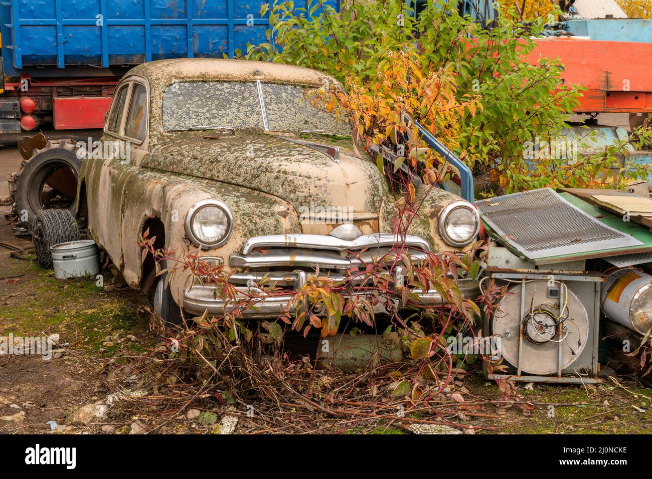 Old rusty car on the junkyard Stock Photo - Alamy