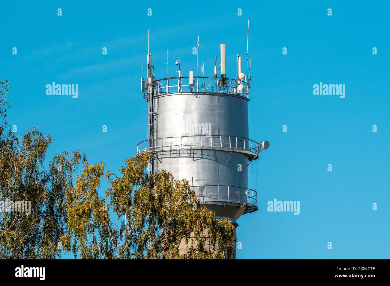 Water tower with communication antennas Stock Photo - Alamy