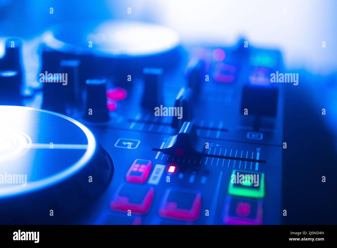 DJ mixing desk turntable Stock Photo - Alamy
