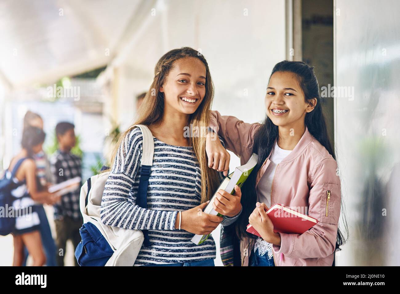 Schoolgirls standing hi-res stock photography and images - Alamy