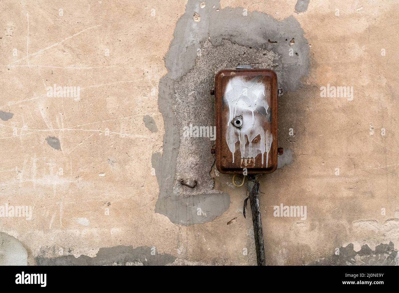 Old electric control box on the concrete wall Stock Photo - Alamy