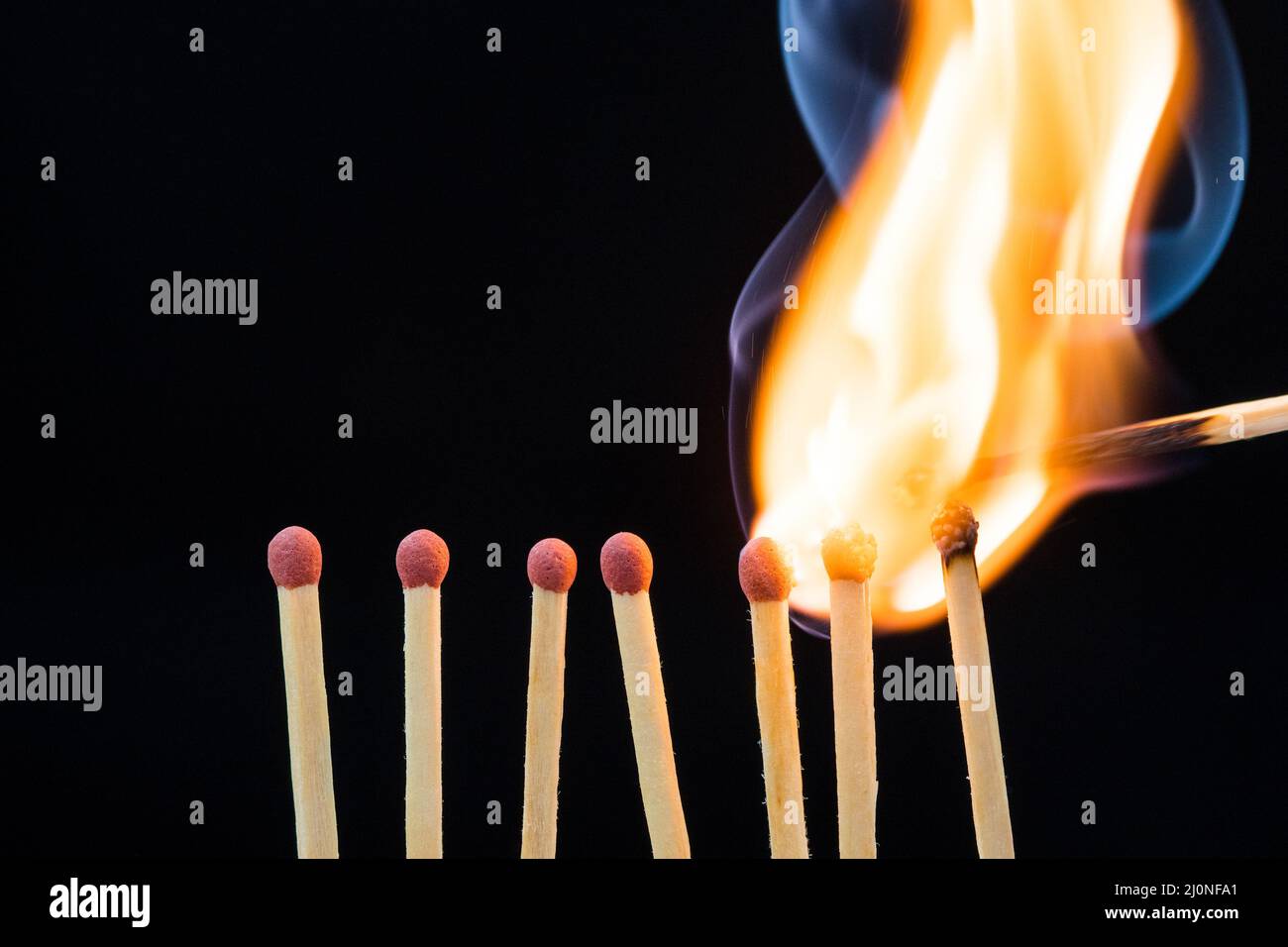 Line of burning matches Stock Photo - Alamy