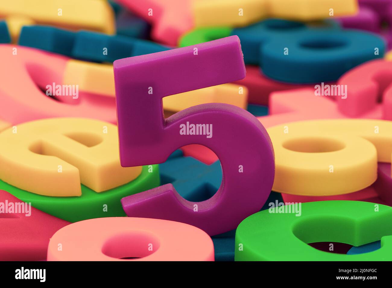 Purple number 5 Stock Photo - Alamy