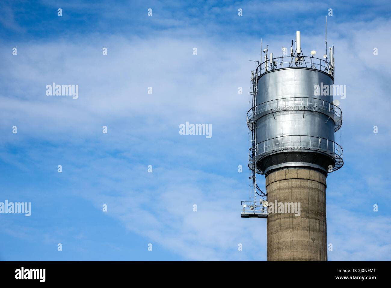 Water tower on sky background Stock Photo - Alamy