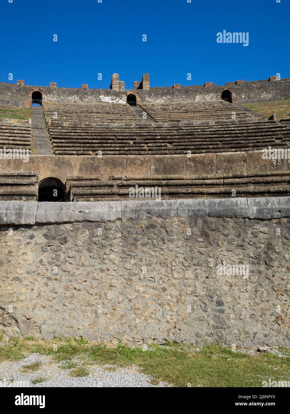 Pompeii Amphitheater interior benches Stock Photo - Alamy