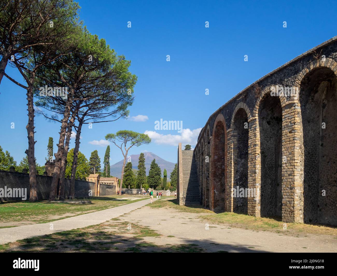 Pompeii Amphitheater exterior with Mount Vesuvius in the background ...