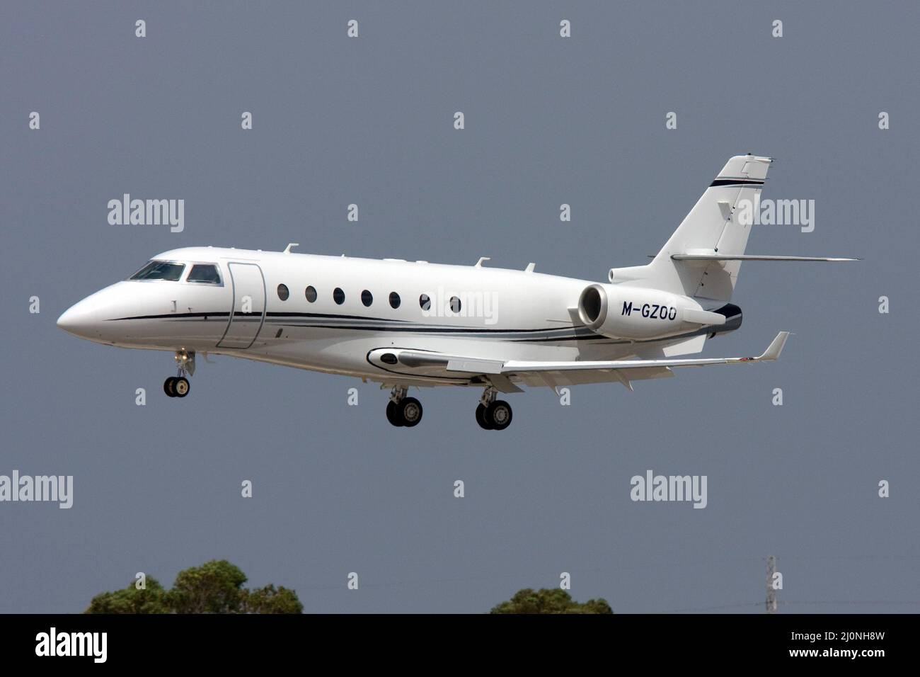 Private Gulfstream Aerospace G200 (REG: M-GZOO) landing runway 32 Stock ...