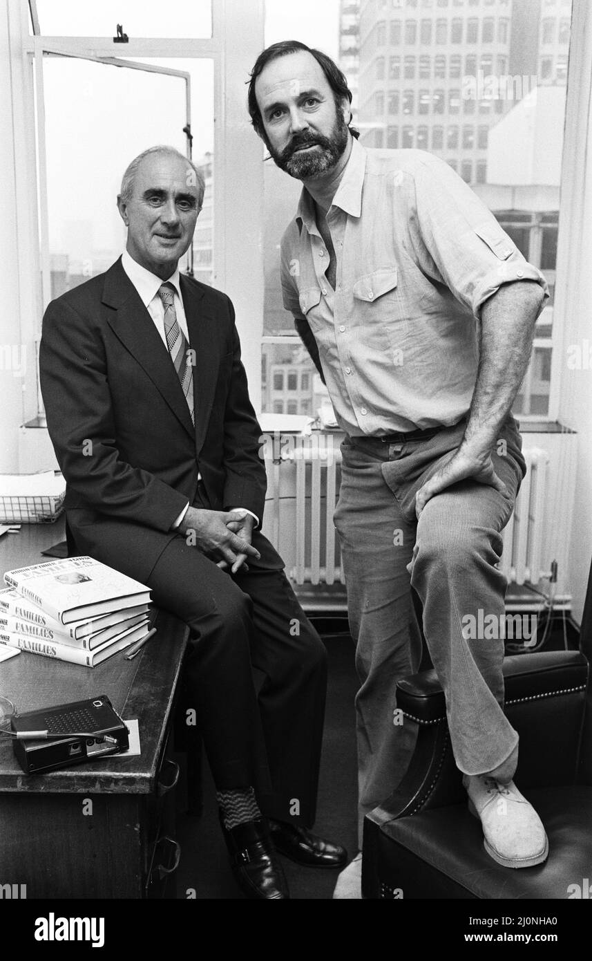 John Cleese with a copy of his book "Families And How To Survive Them ...