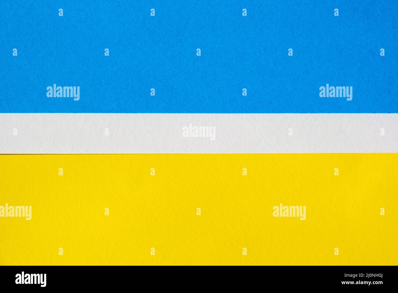 Ukrainian national flag made of paper. Mock up template for your text ...