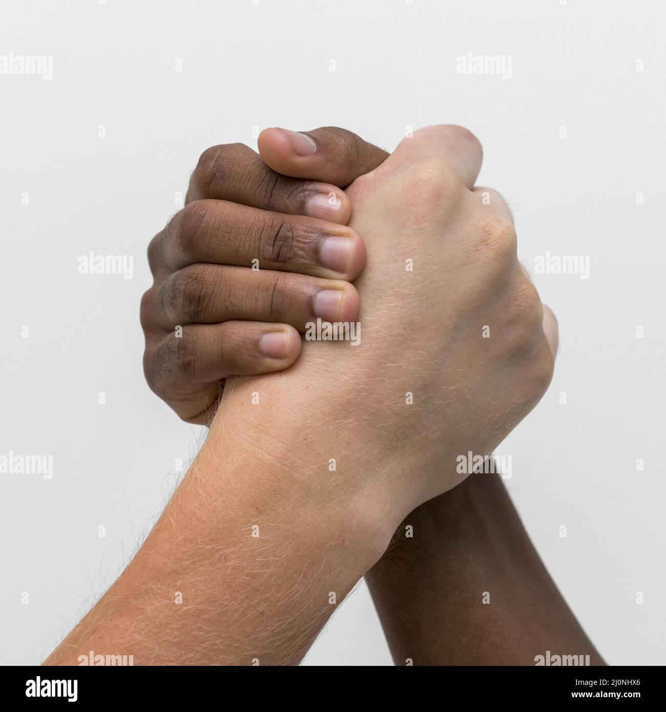 Multiracial hands coming together (1) . High quality and resolution ...