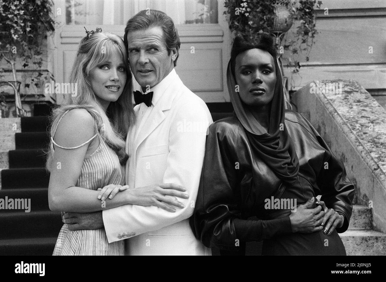 Grace jones roger moore Black and White Stock Photos & Images - Alamy