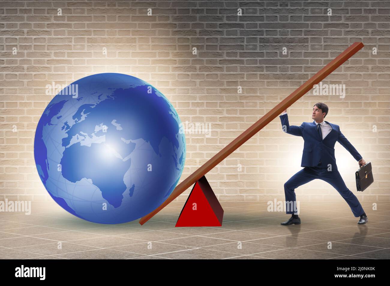 Businessman lifting the earth in challenge concept Stock Photo - Alamy