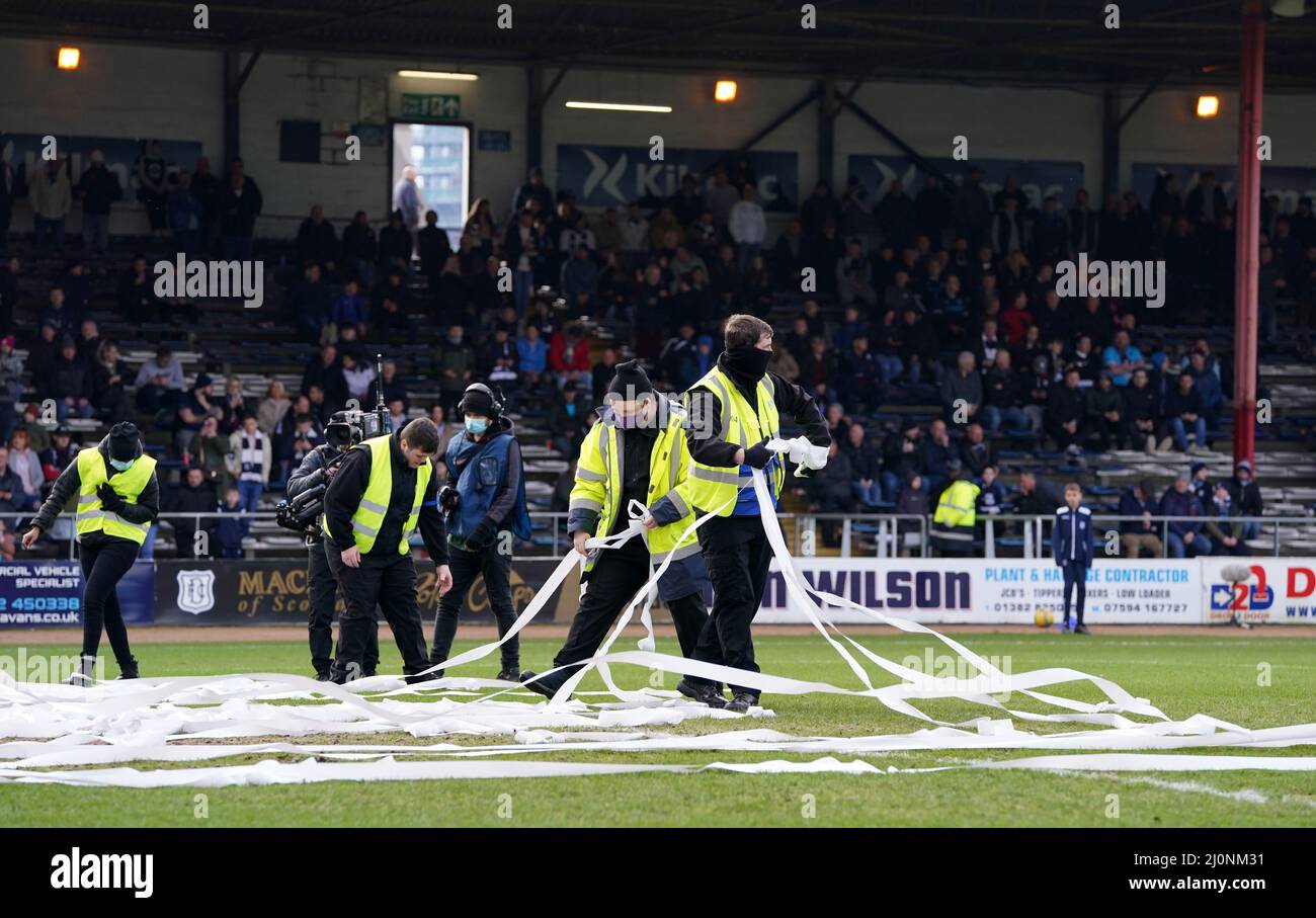 Stewards clean streamers off the pitch prior to the cinch Premiership ...