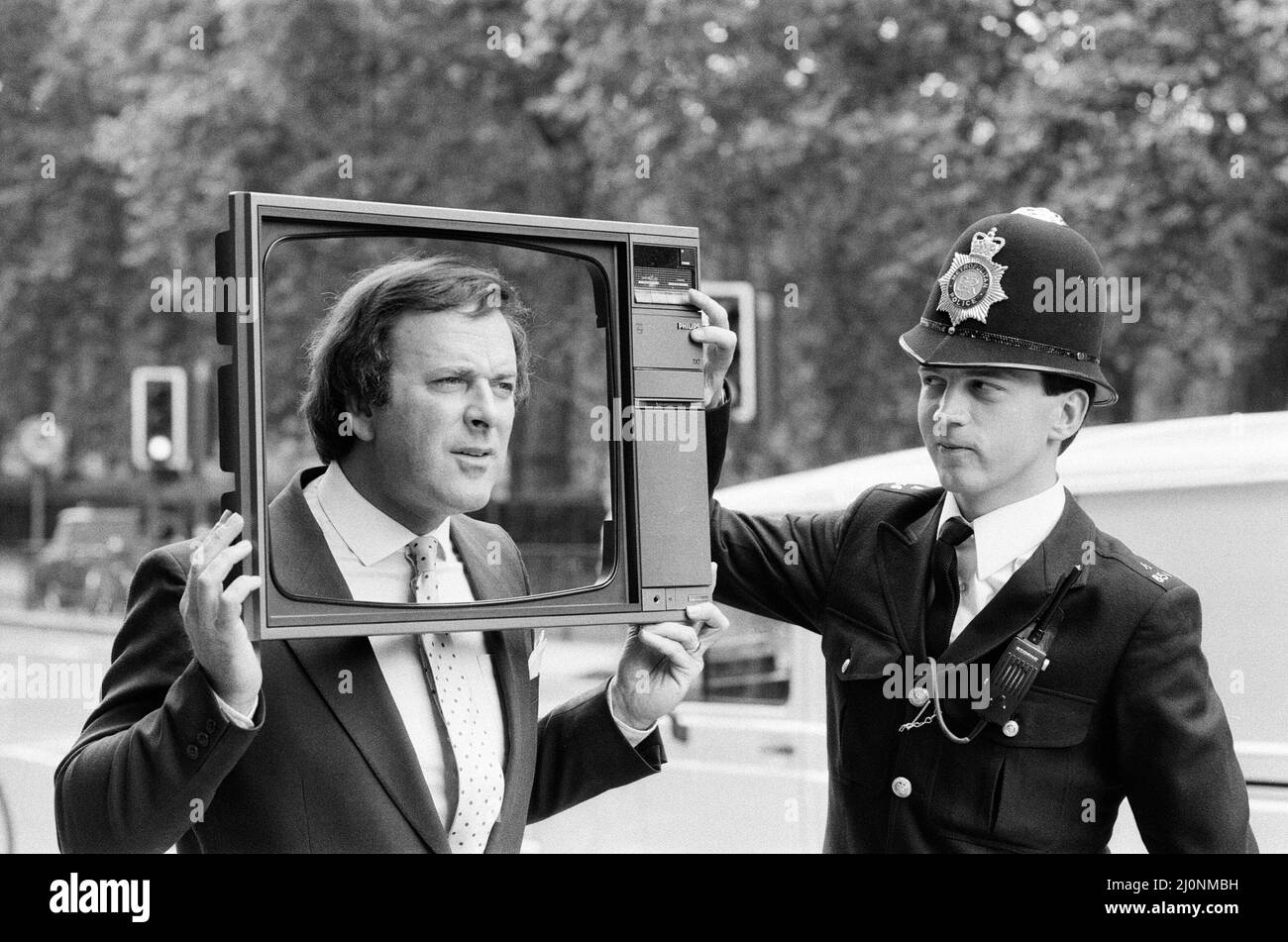 Terry Wogan was given 100 new TV sets today. They are being presented ...