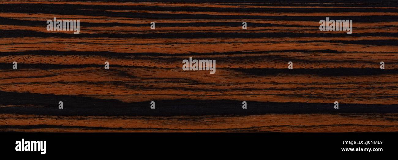 Expensive brown ebony veneer background for your unusual design project ...