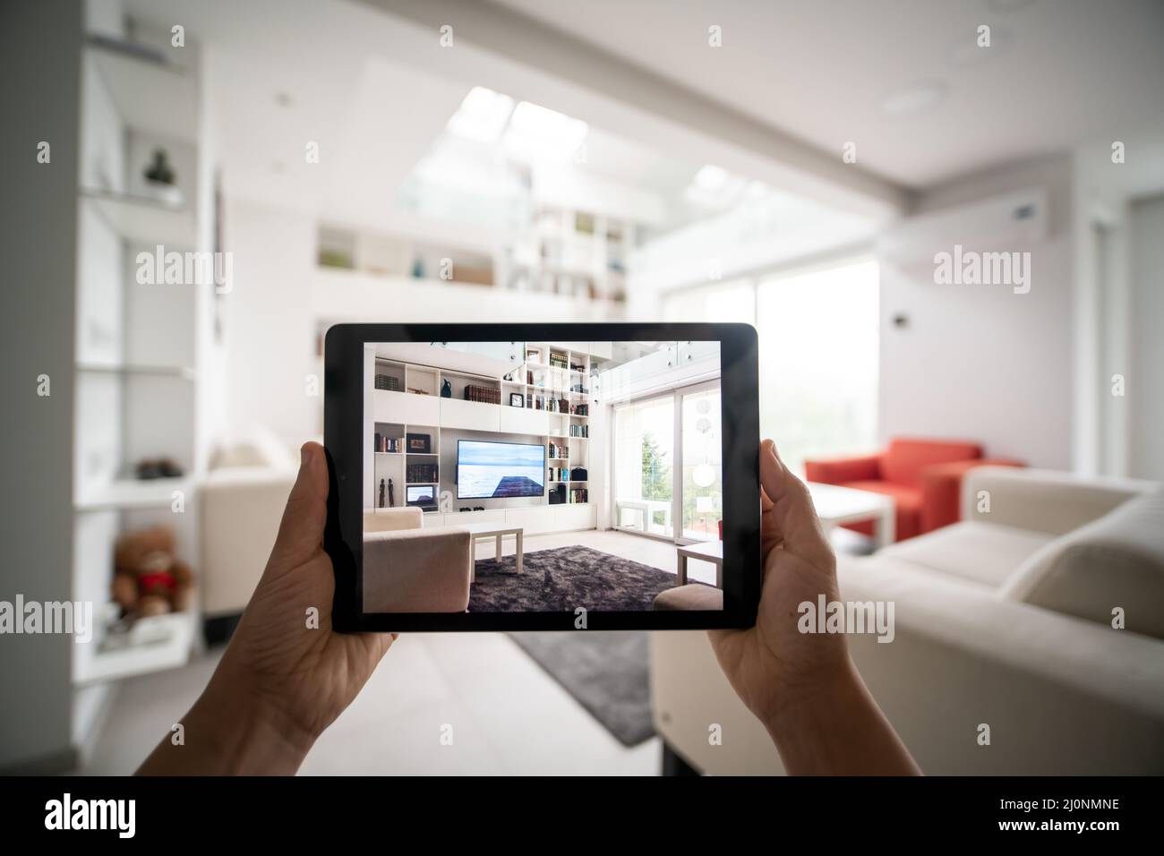 Decorating Apartment with Augmented Reality Interior Design Software Stock Photo - Alamy