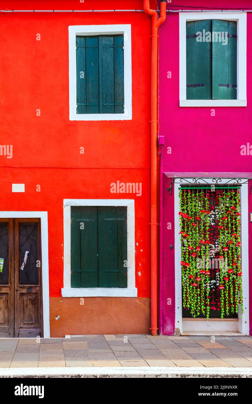 Facade of a lovely red house Stock Photo - Alamy