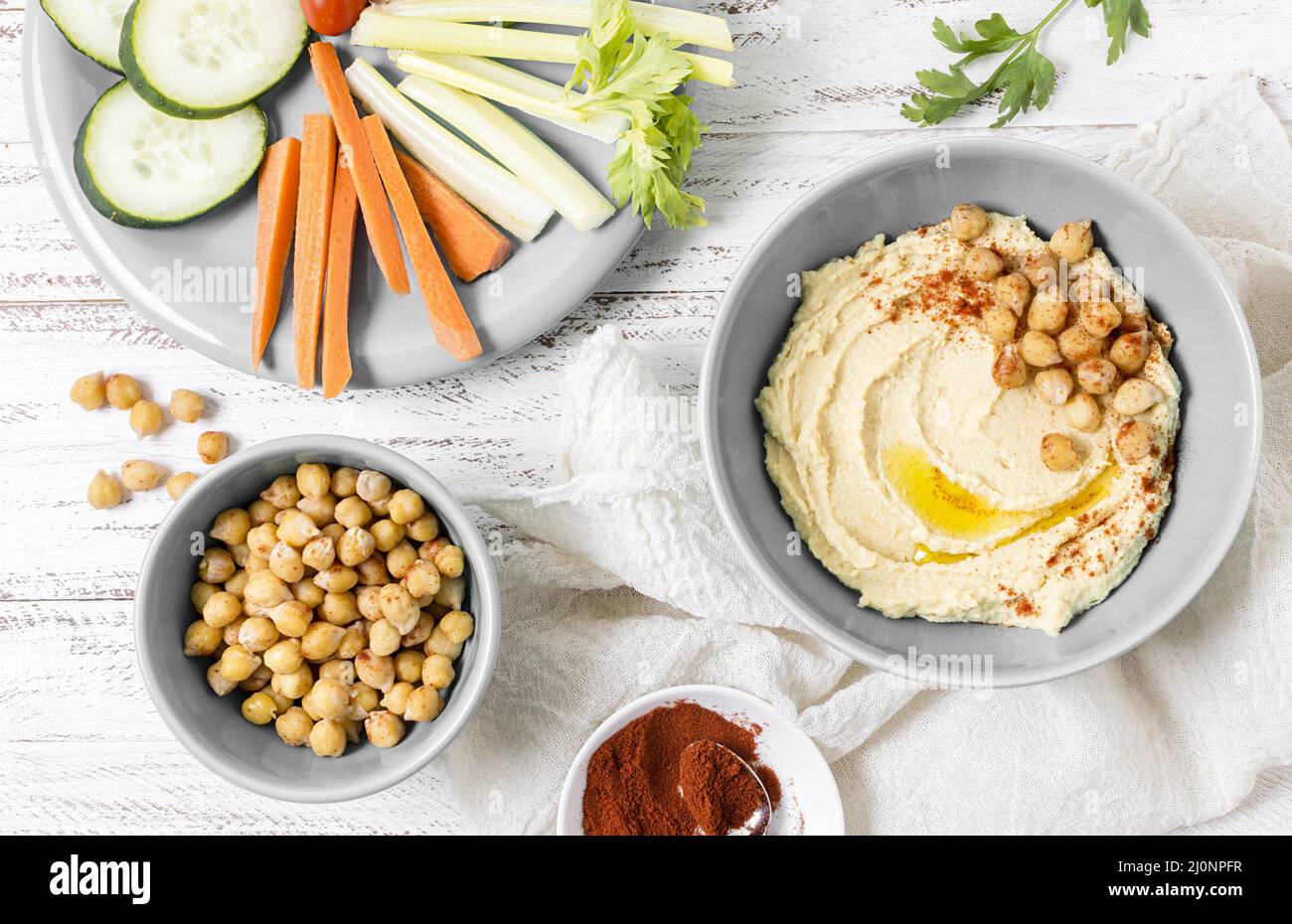 Top view hummus with chickpeas vegetables. High quality and resolution ...